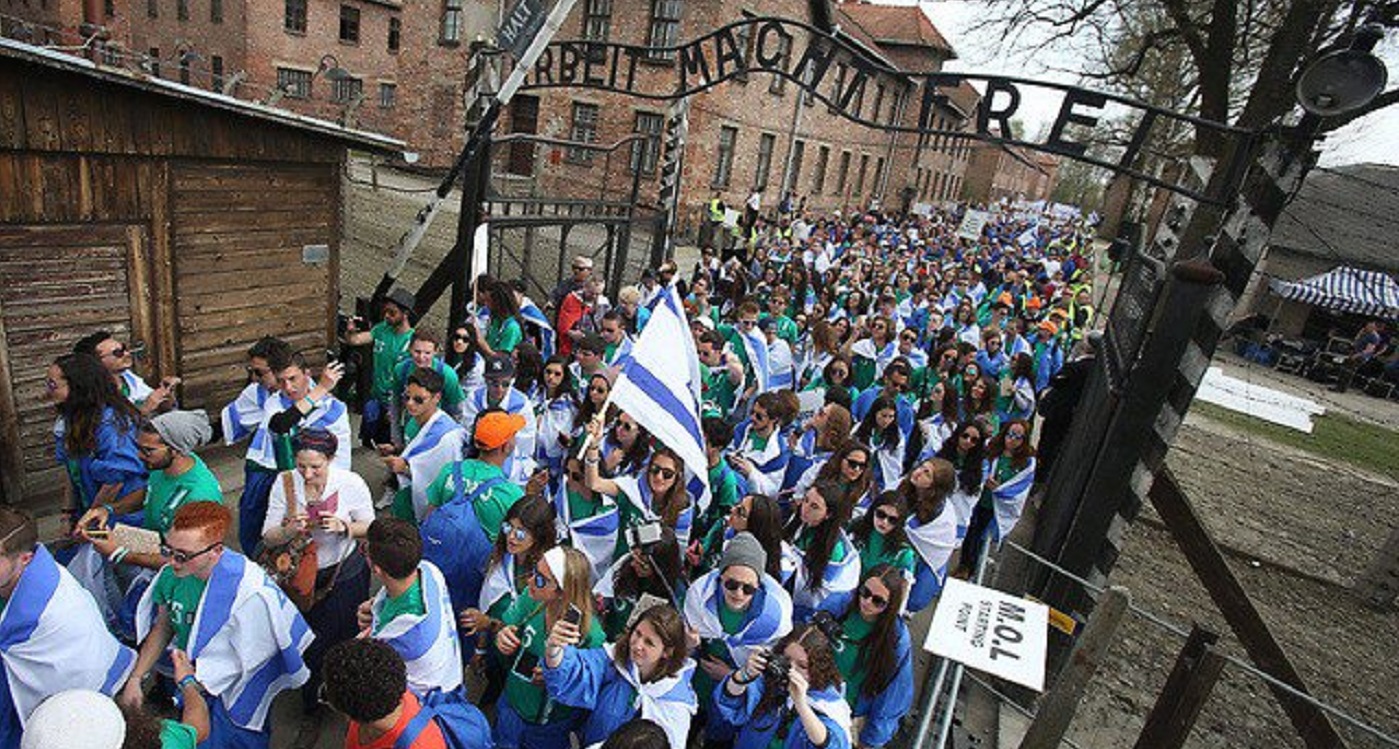 Thousands of Jewish young people march at Auschwitz for March of the Living