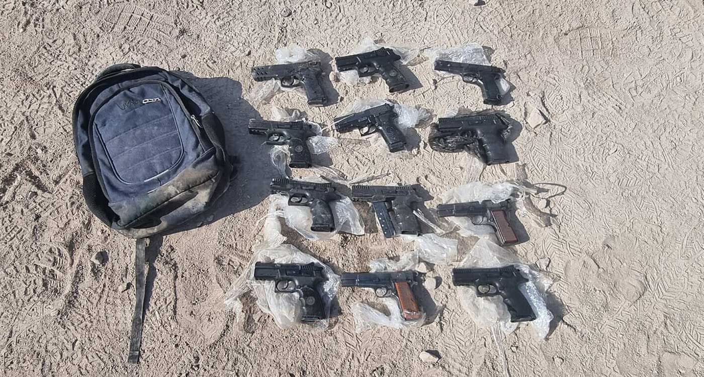 Israeli police seize 12 hand guns being smuggled on Jordanian border